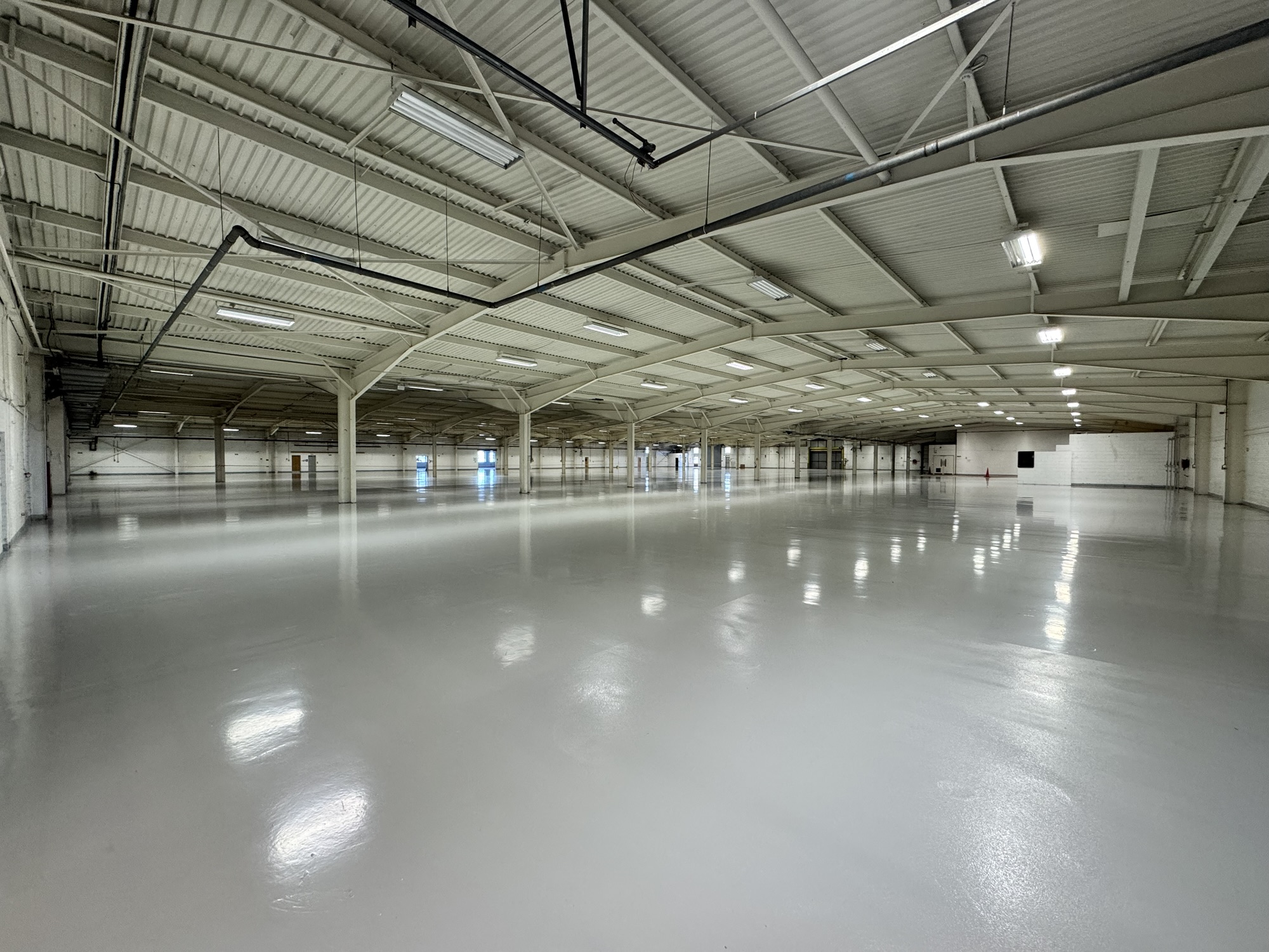 140,000 sqft warehouse refurbishment project completed - Adept Building ...